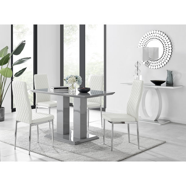 East Urban Home Eubanks High Gloss Double Pillar Dining Table Set with 4 Luxury Faux Leather ...